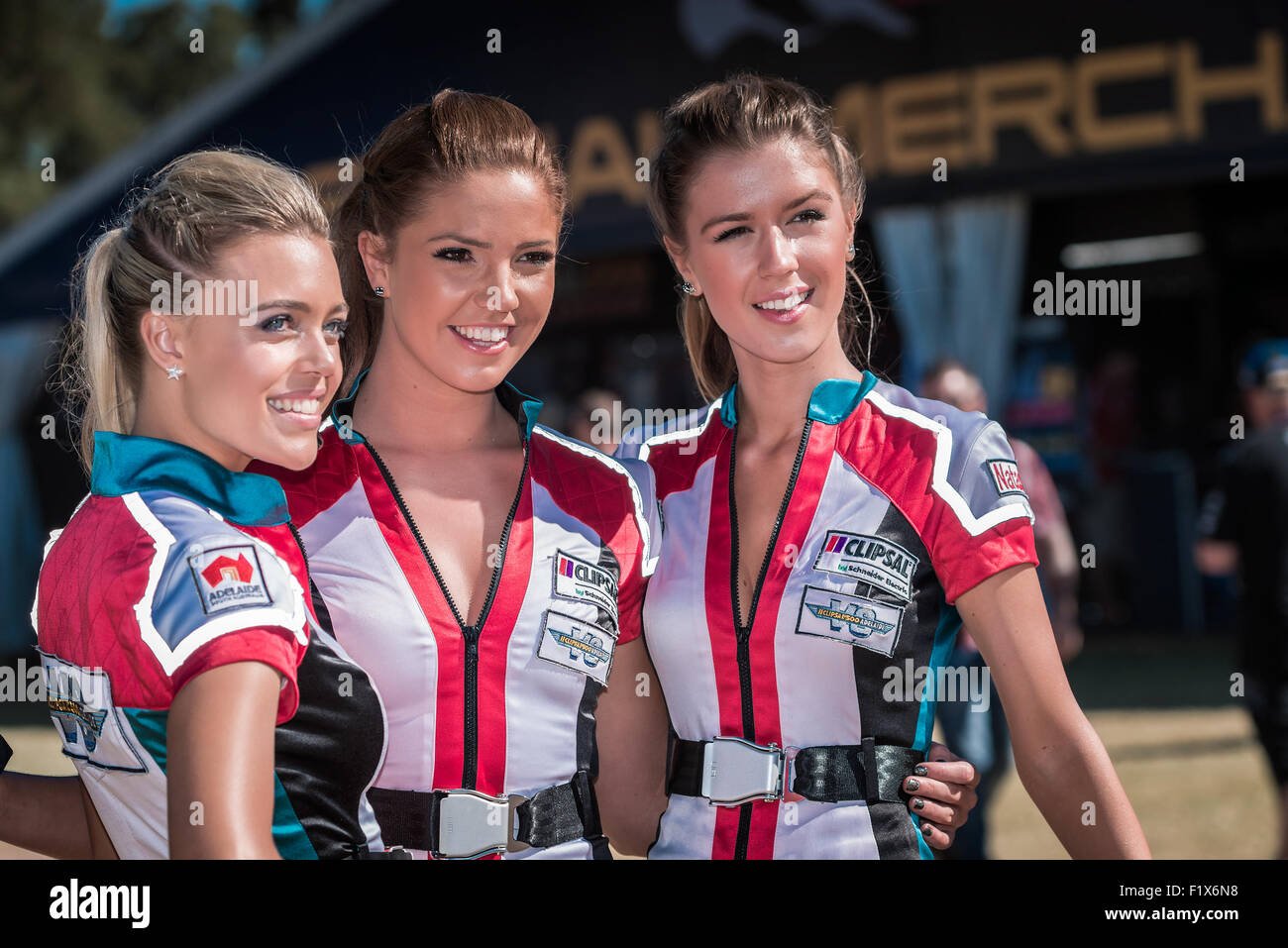 Adelaide, South Australia - March 01, 2014: Grid girls are interacting ...