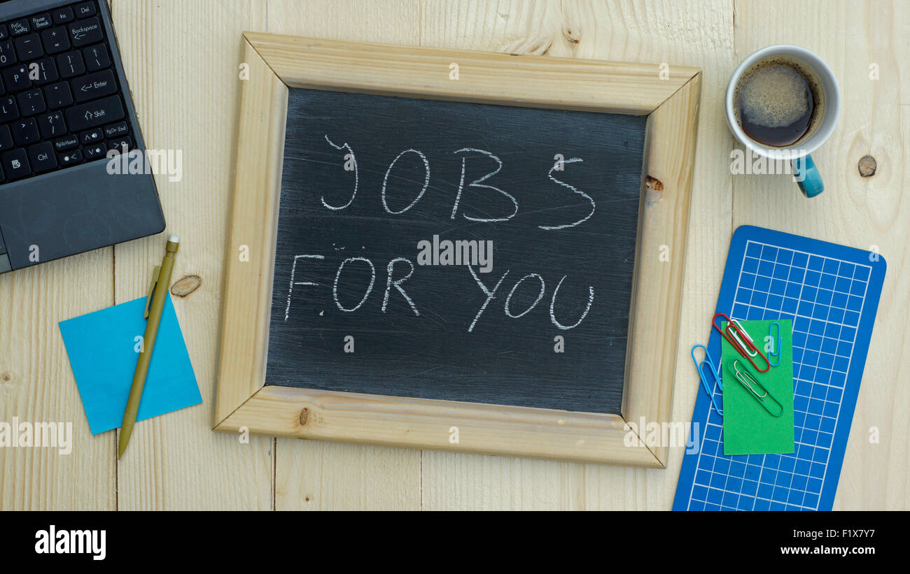Jobs for you written on a chalkboard at the office Stock Photo - Alamy