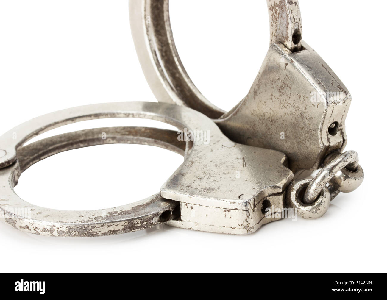 retro handcuffs isolated on the white background Stock Photo - Alamy