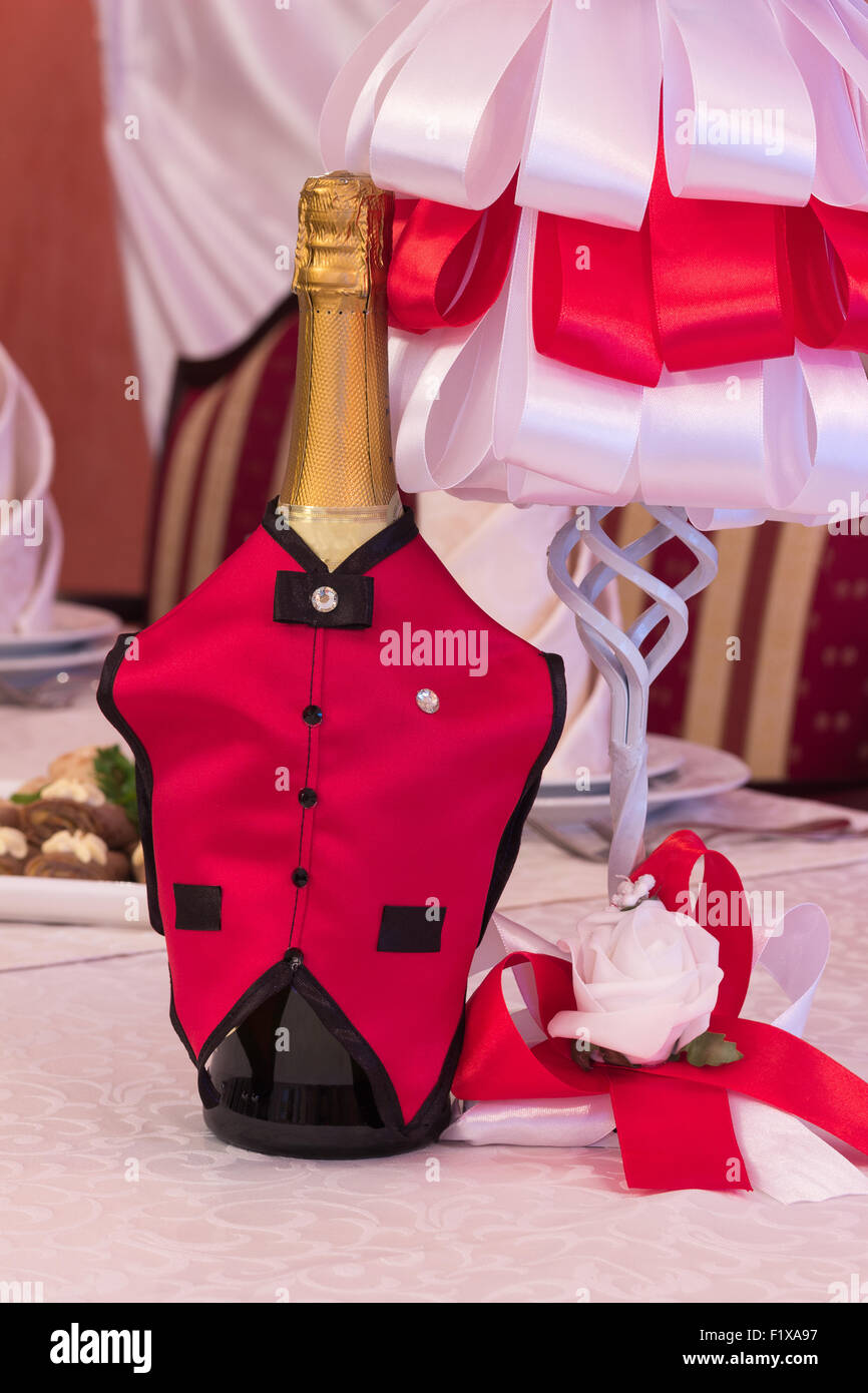 champagne bottle with glass on the table Stock Photo - Alamy