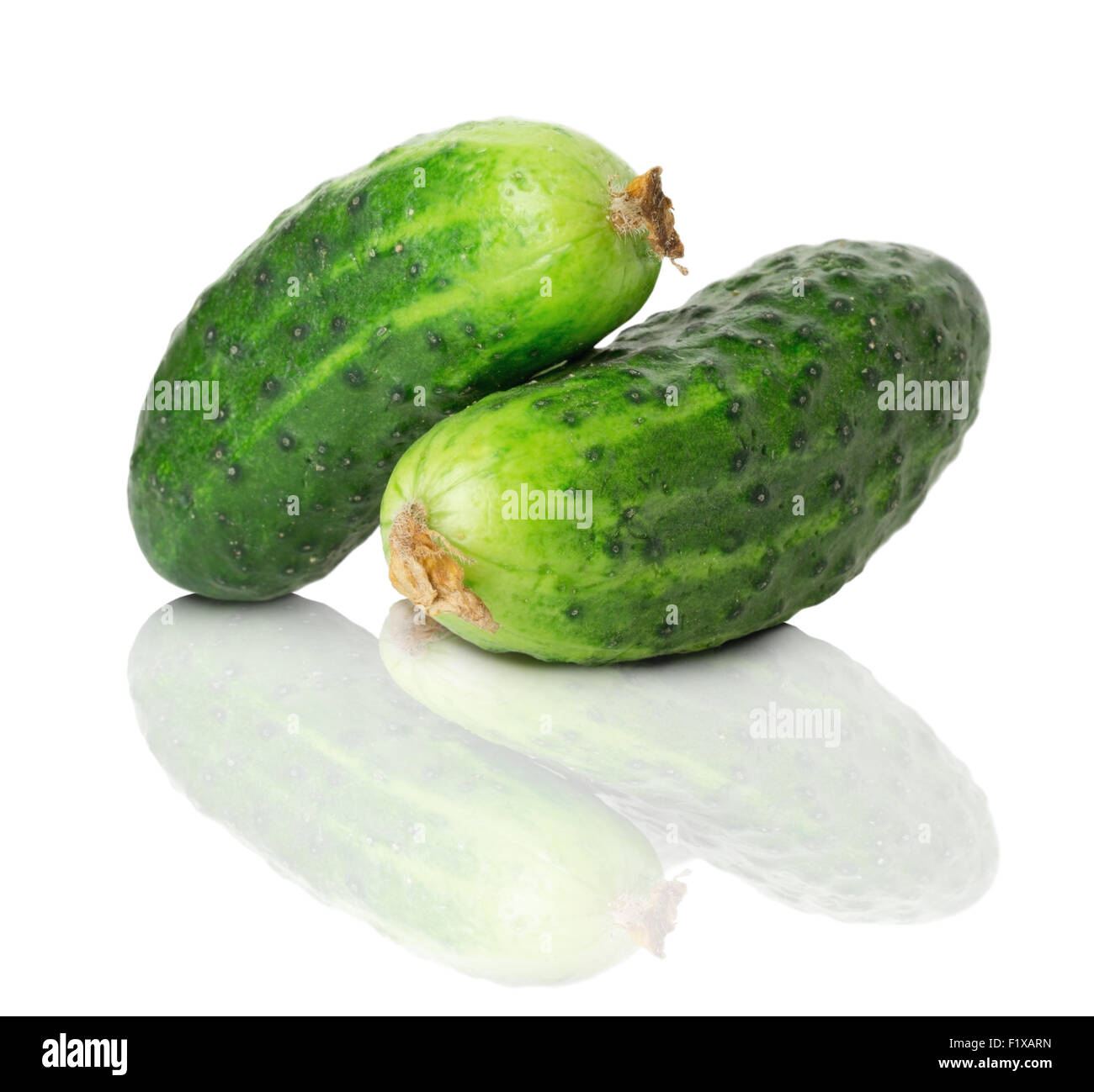 two cucumbers on the white background Stock Photo - Alamy