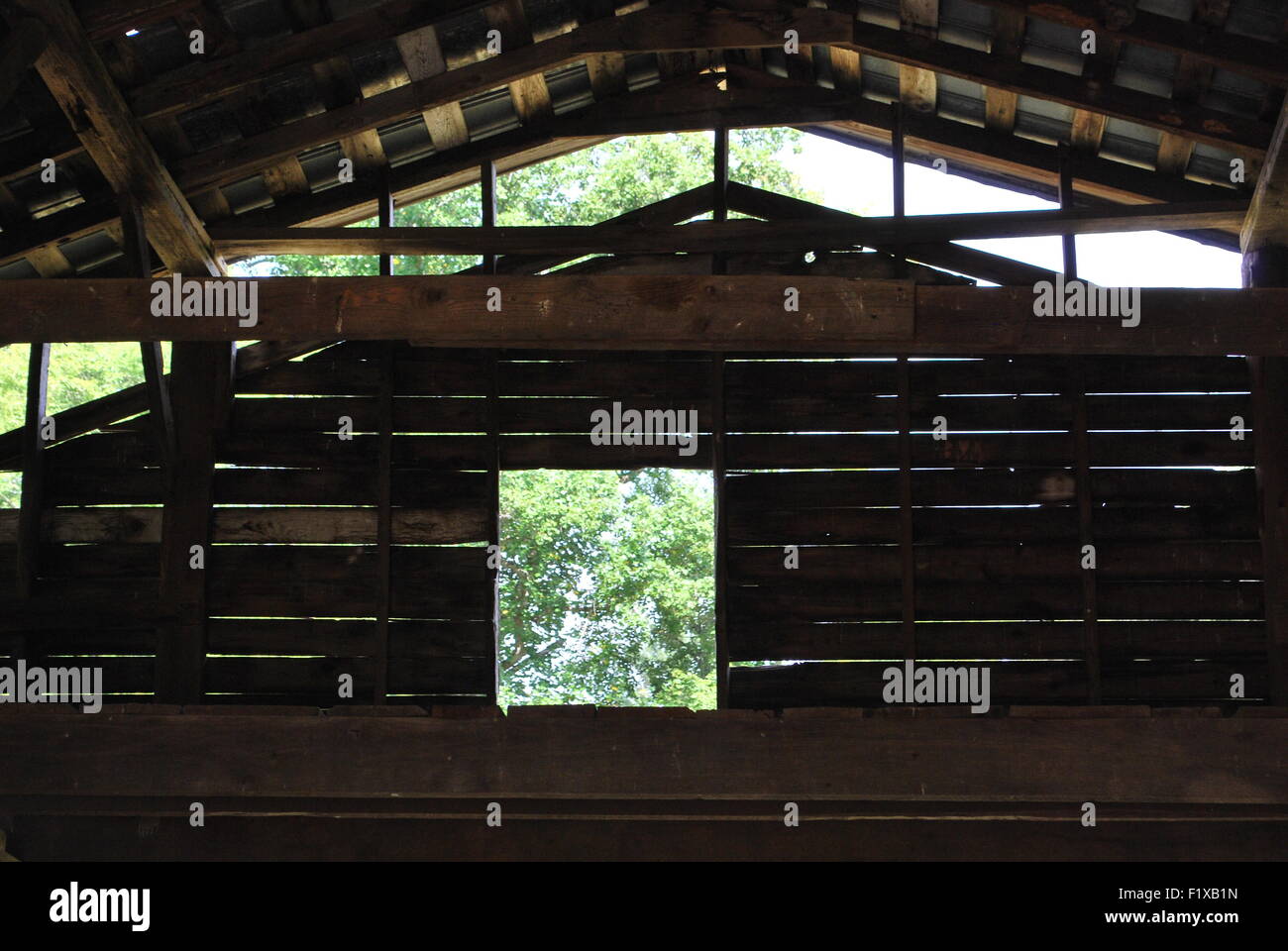 Looking out a window of a vintage barn loft Stock Photo - Alamy