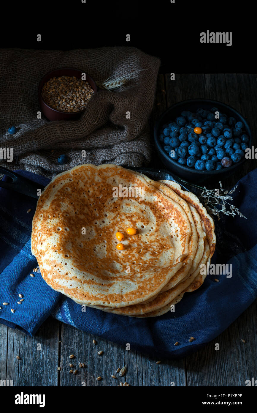 Blintzes or blinis - traditional thick russian crepes. Rustic still ...