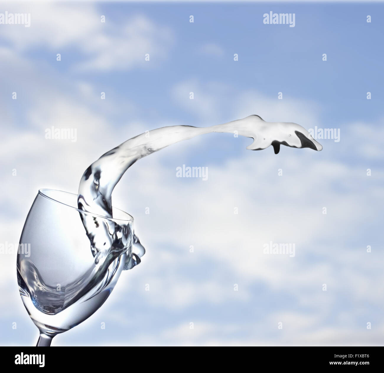 splash of white wine on the sky background Stock Photo - Alamy