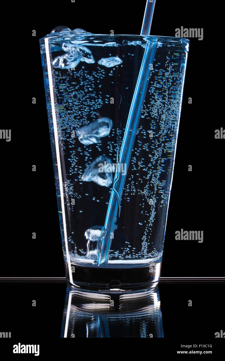 glass with water and Bubbles on a black background Stock Photo - Alamy