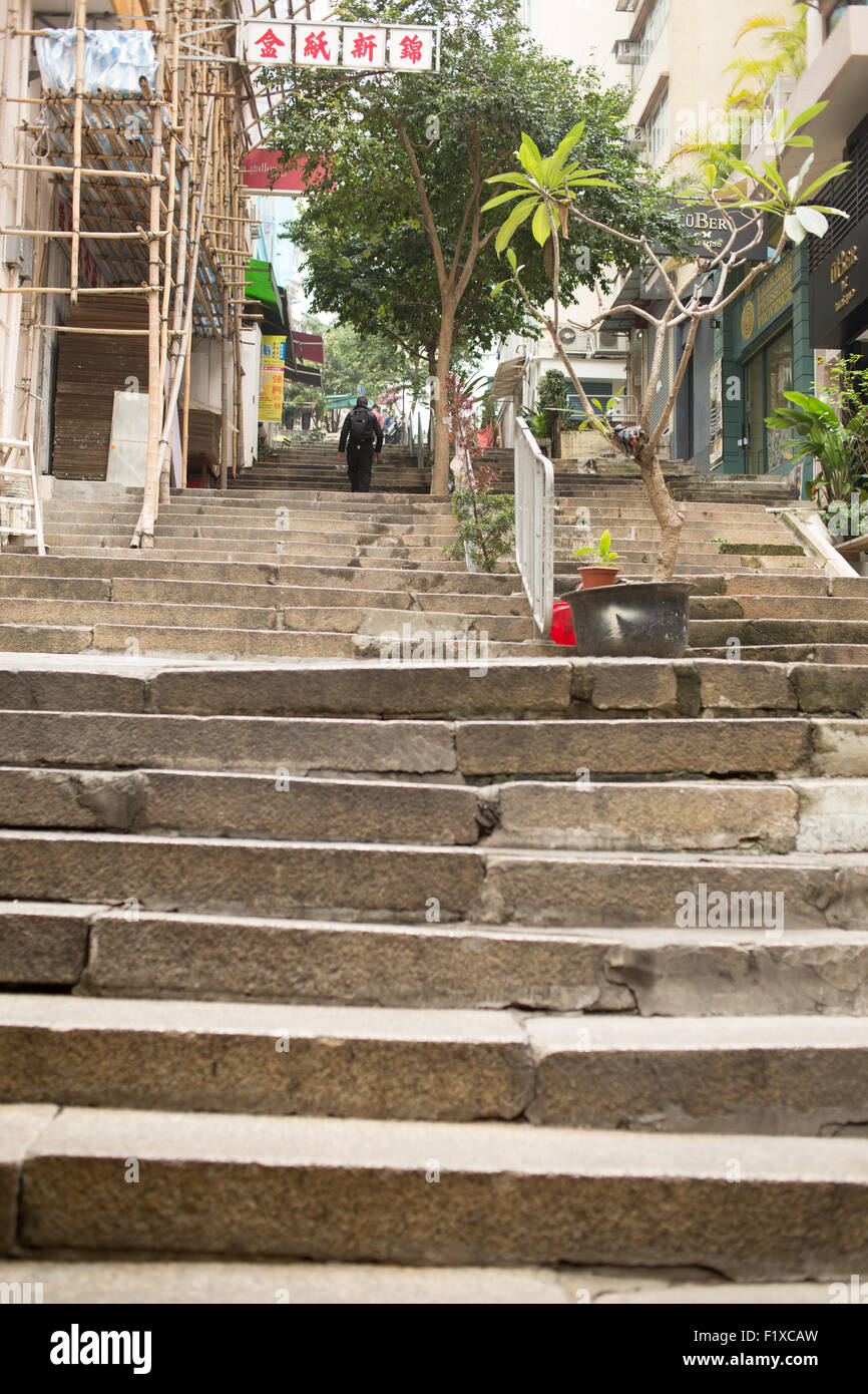 Walking up steps man hi-res stock photography and images - Alamy
