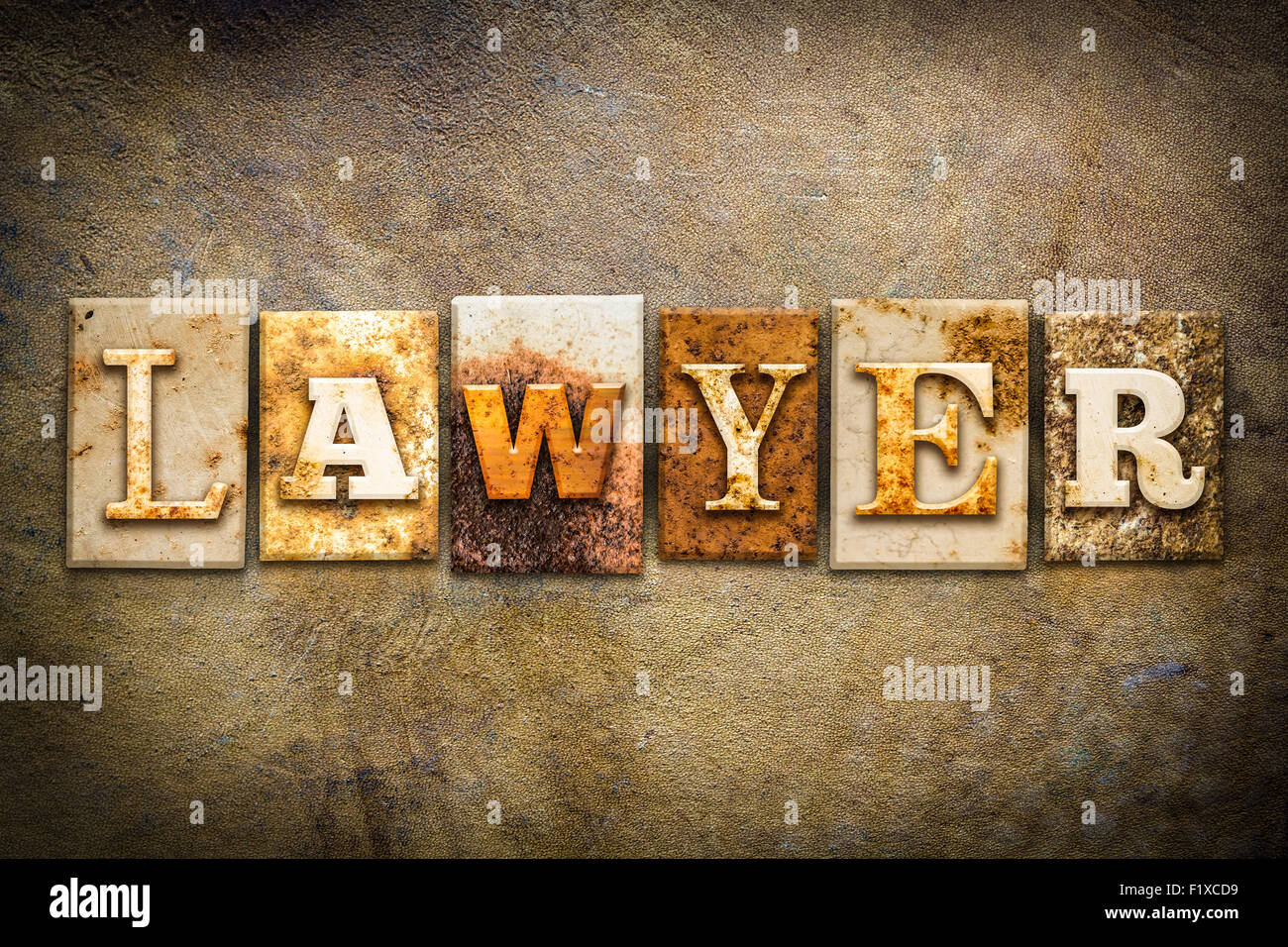The word "LAWYER" written in rusty metal letterpress type on an old ...