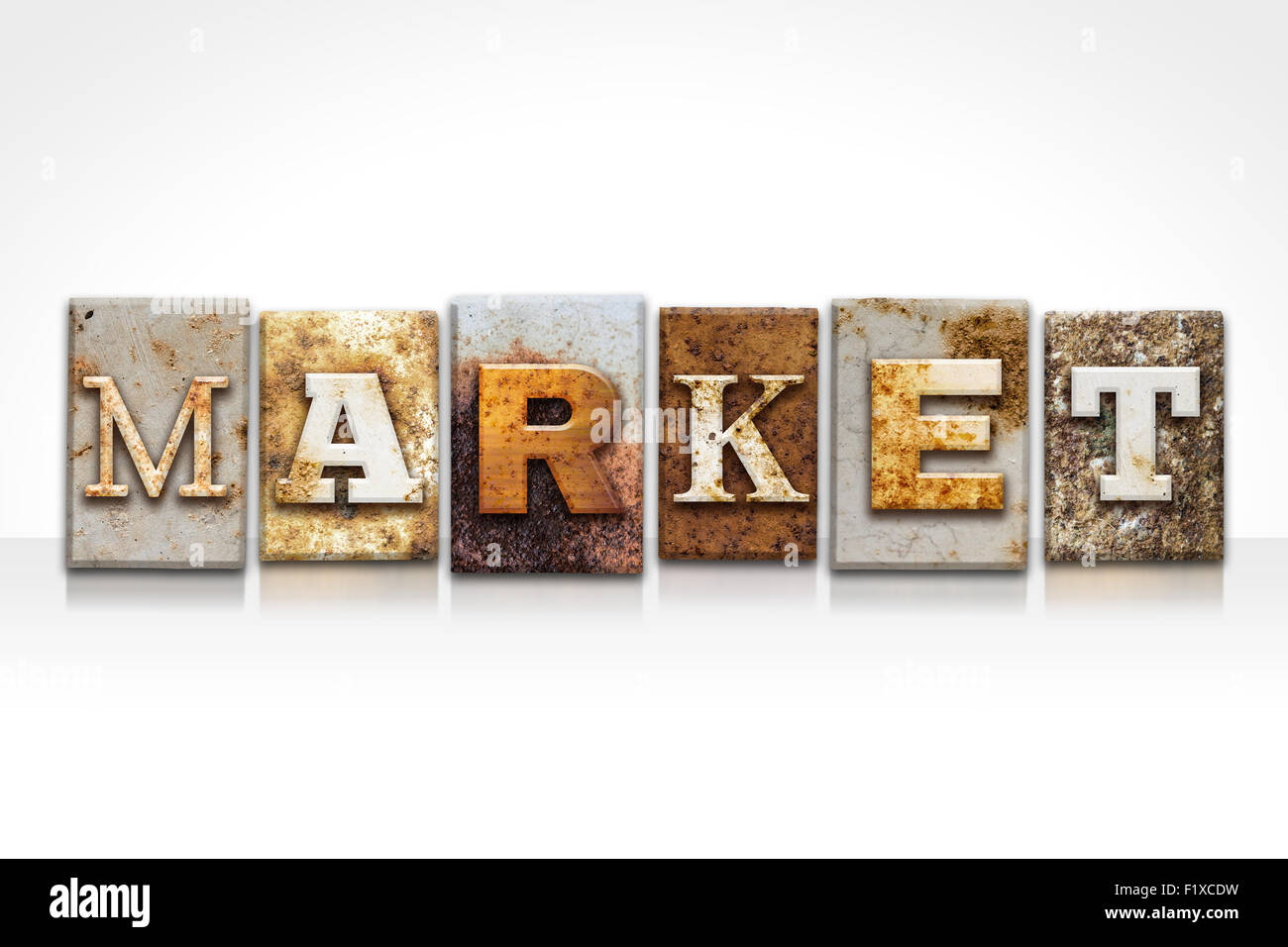 The word "MARKET" written in rusty metal letterpress type isolated on a ...