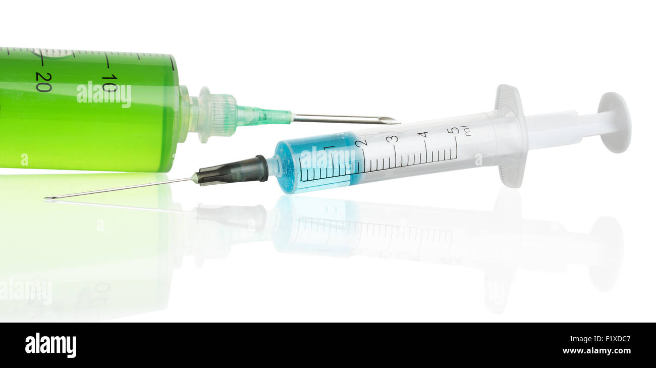 syringes on white background Stock Photo - Alamy