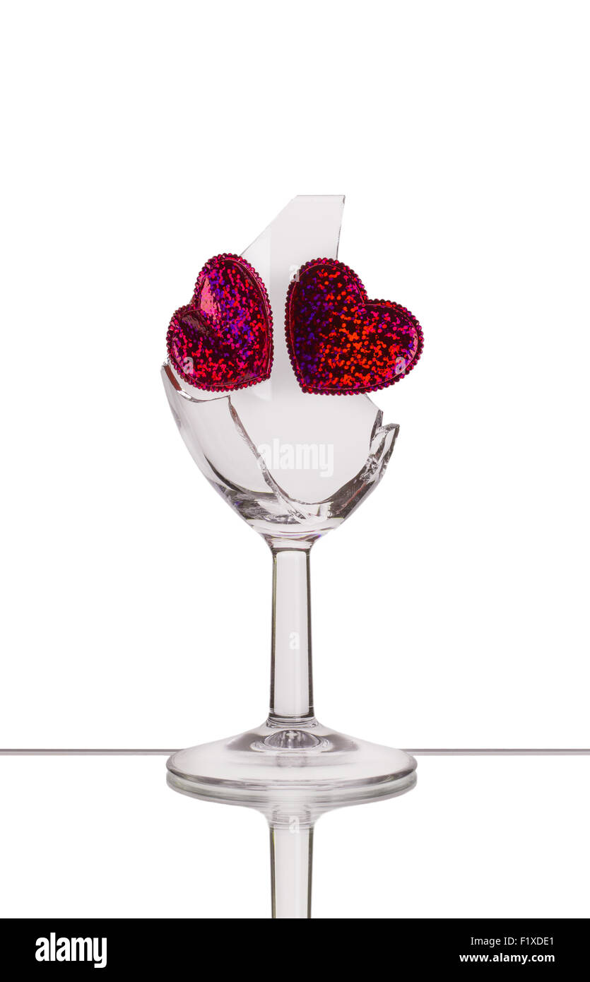 broken glass with two hearts Stock Photo - Alamy