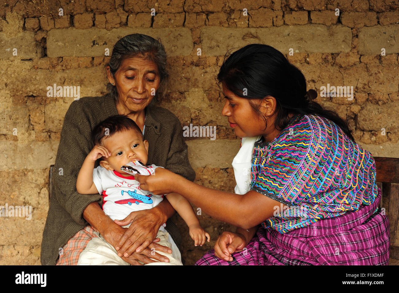Guatemala, Salama, mother serving complementary food for baby (Maria de ...