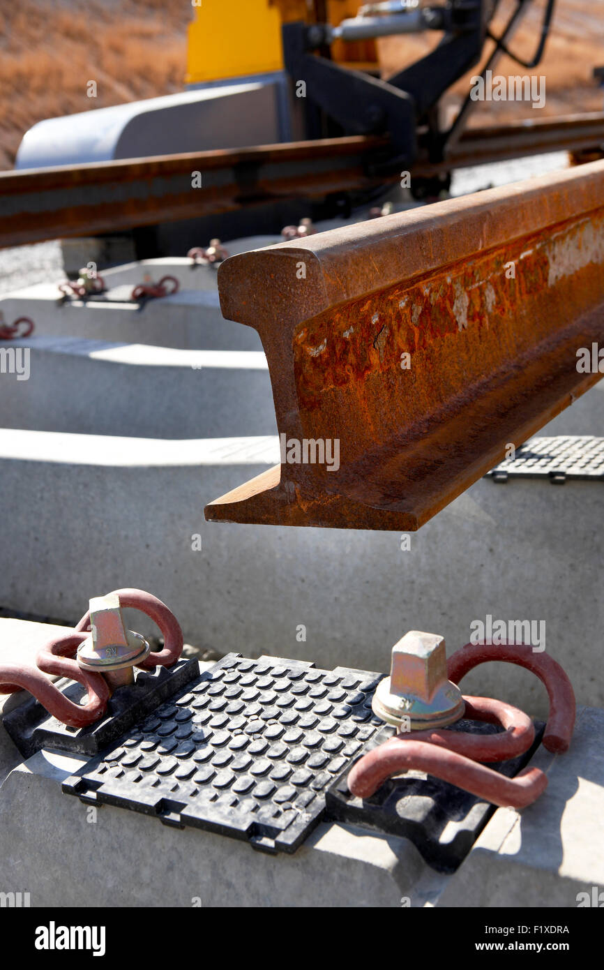 Railway assembly system process detail outdoors vertical Stock Photo ...