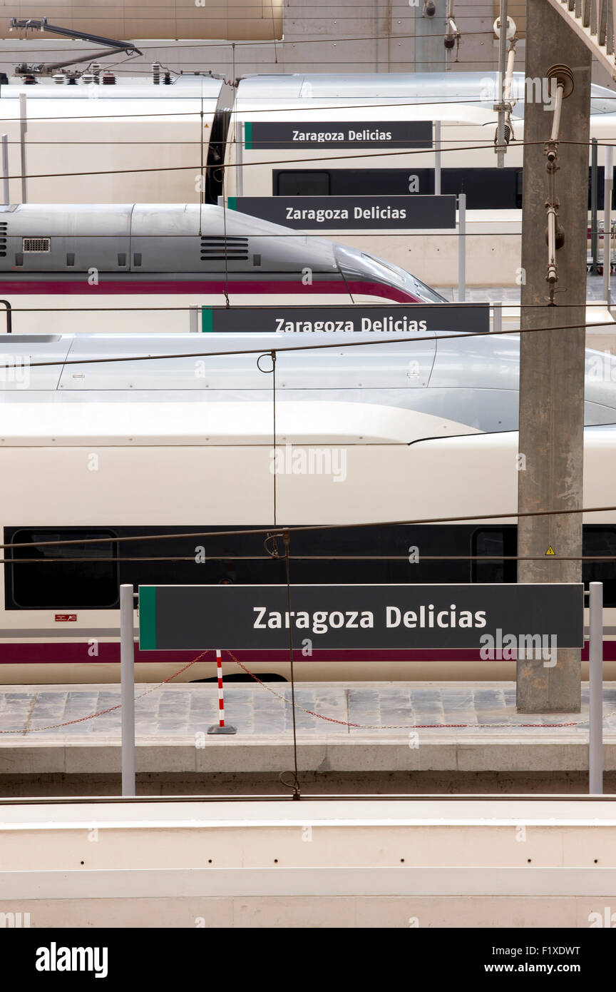 High-speed trains platforms in a railway station perspective vertical ...