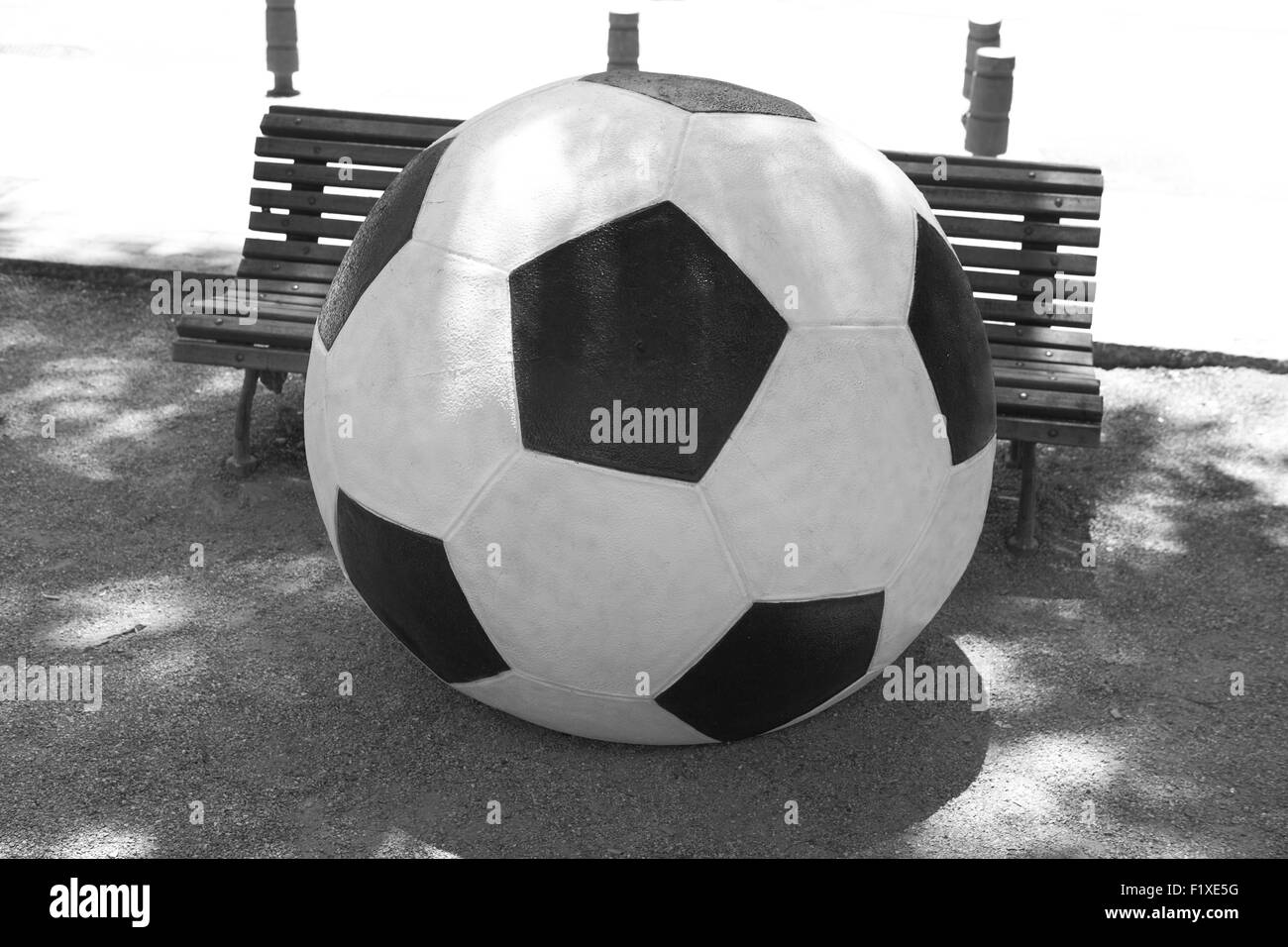 Soccer ball disguise on a street black and white Stock Photo - Alamy