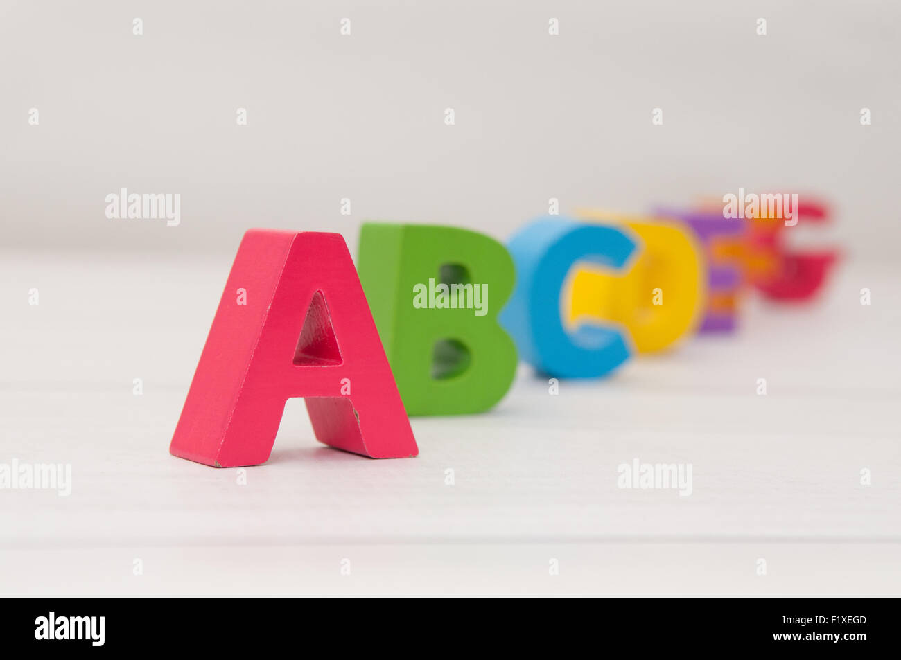 Children with letters hi-res stock photography and images - Alamy