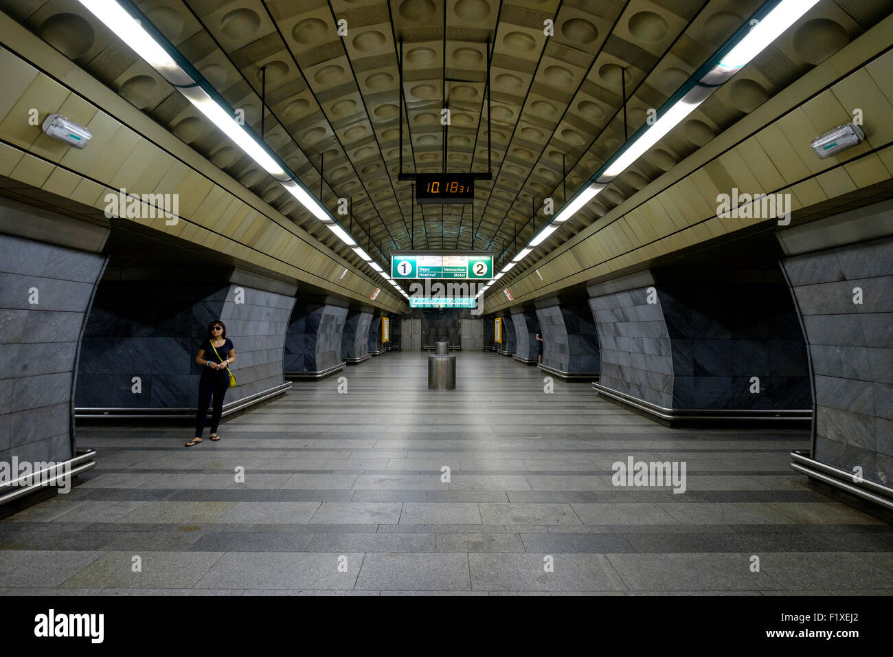 Woman alone subway station hi-res stock photography and images - Alamy