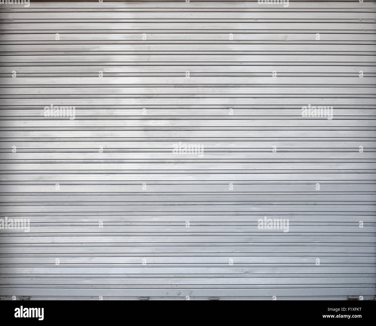 Gray roller shutter metal garage gate, background photo texture Stock ...