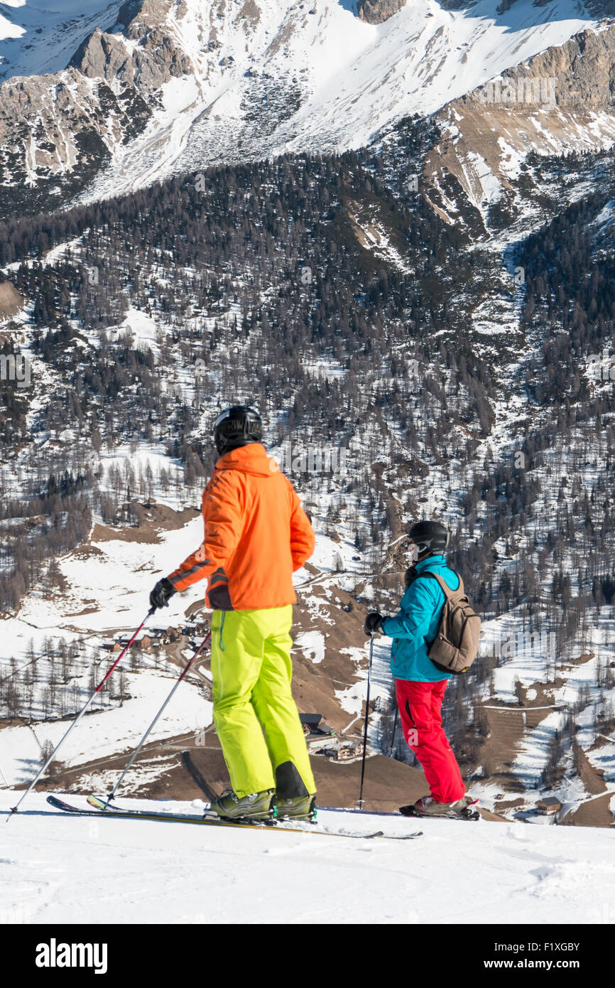 skiers with colorful clothes and helmet waiting for skiing Stock Photo ...