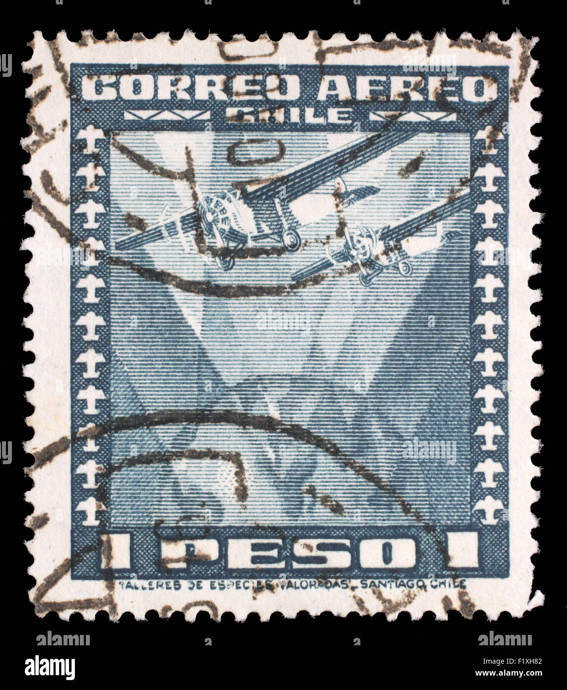 Stamp printed in Chile shows Fokker Super Universal Aircraft over Globe ...