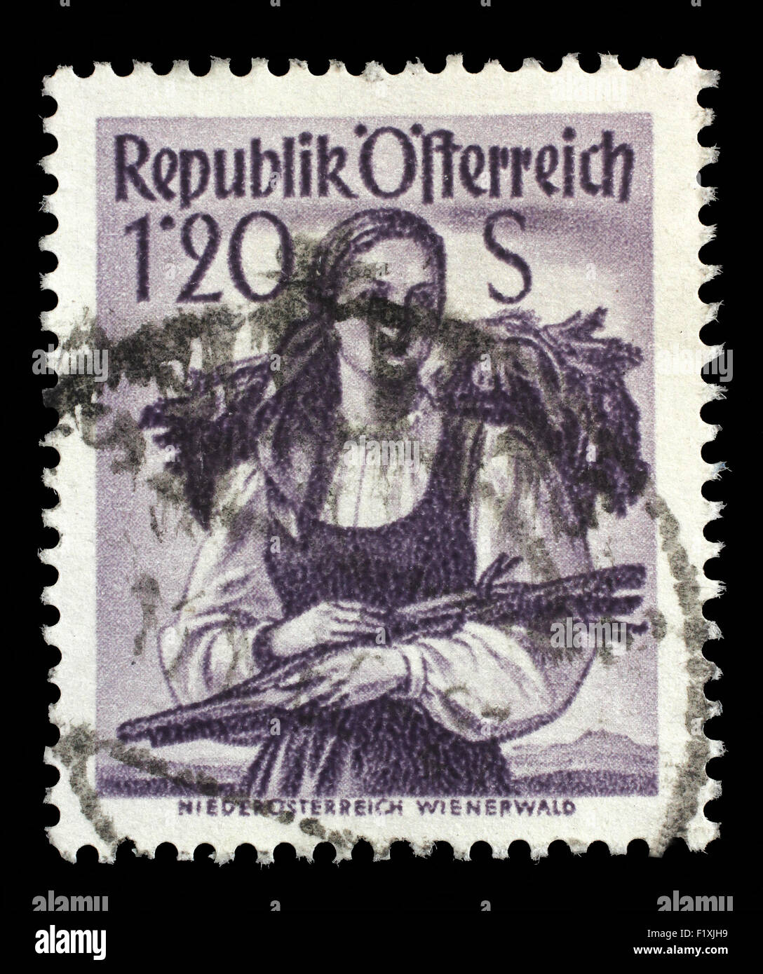 Stamp printed in Austria shows image woman in national Austrian ...
