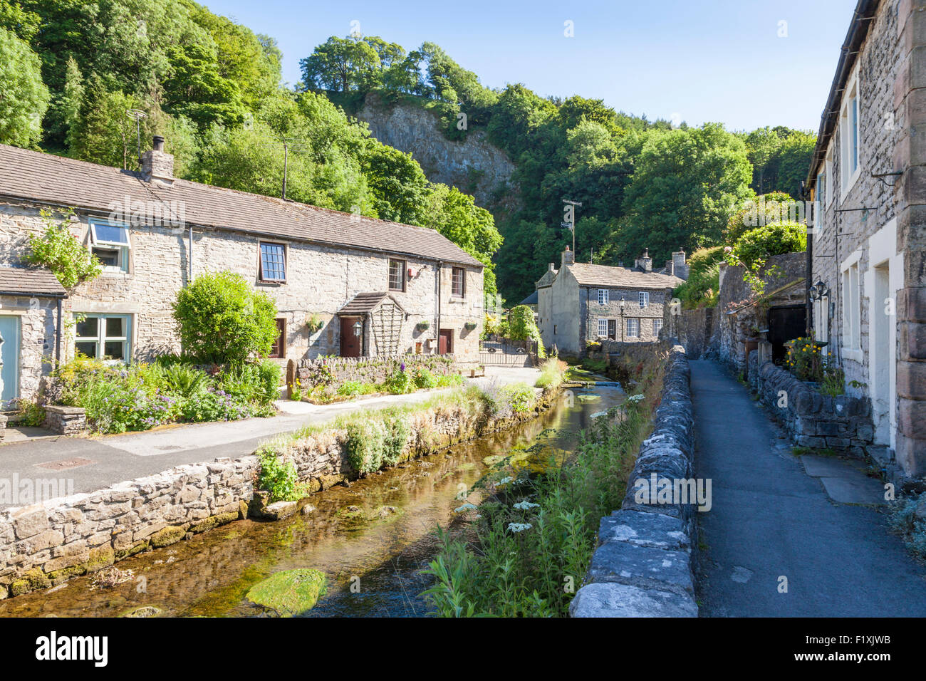 Peakshole Water, a stream flowing through the English village of ...