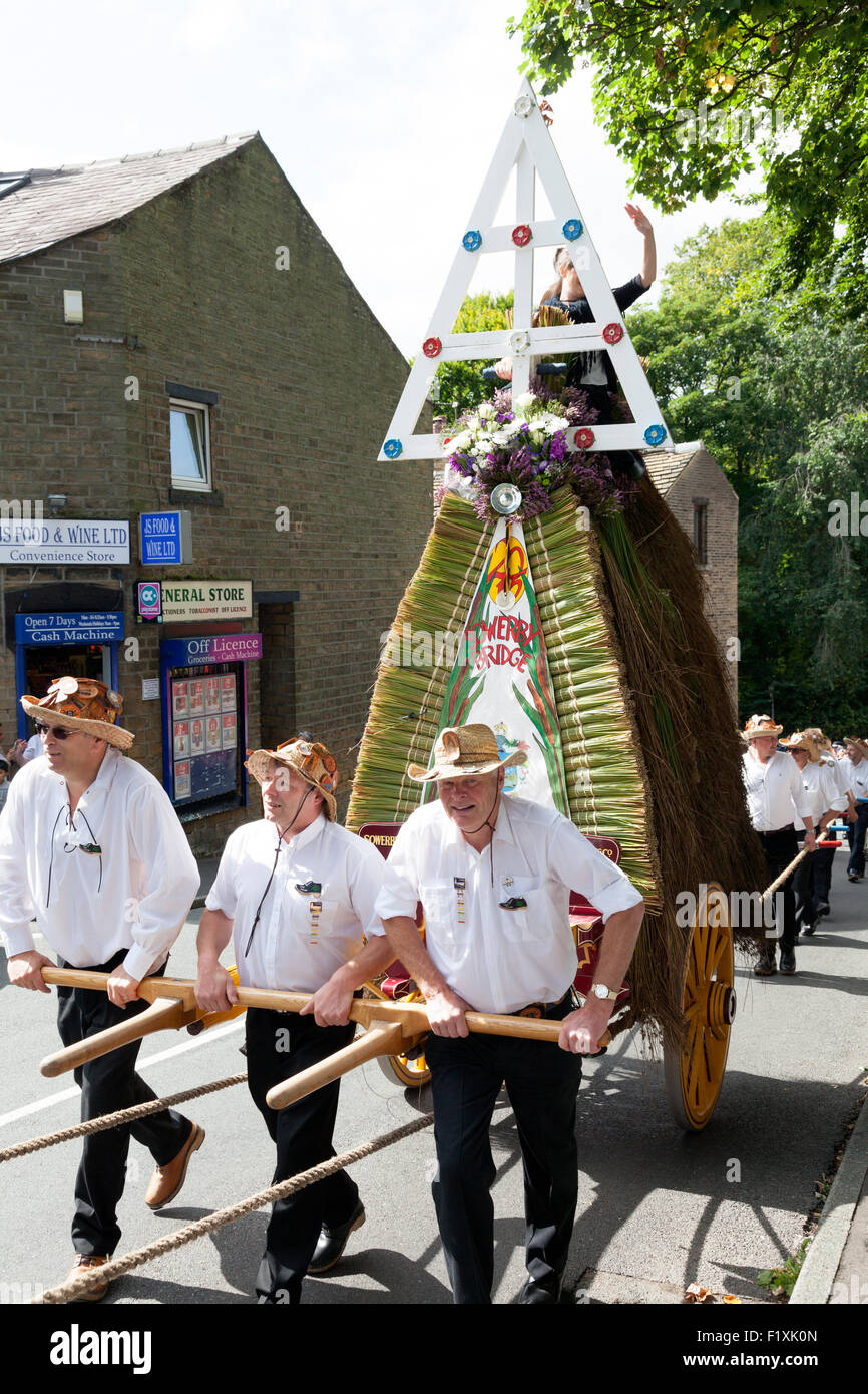 Men pulling the rushcart in the Rushbearing festival procession ...