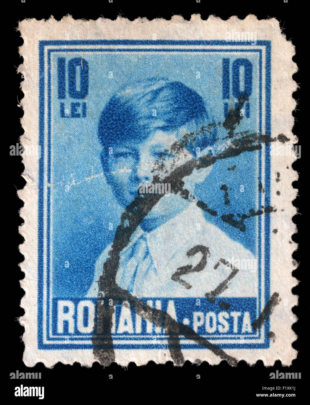 Stamp printed in Romania shows portrait of King Michael, circa 1928 ...