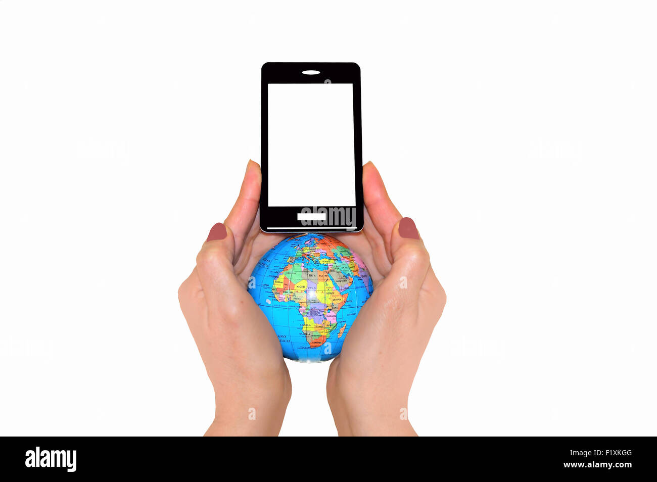 Globe and phone in two hands Stock Photo - Alamy