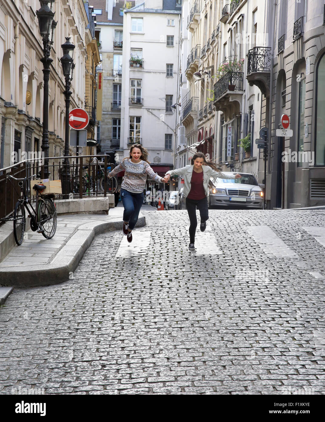 Happy beautiful student girls in Paris Stock Photo - Alamy