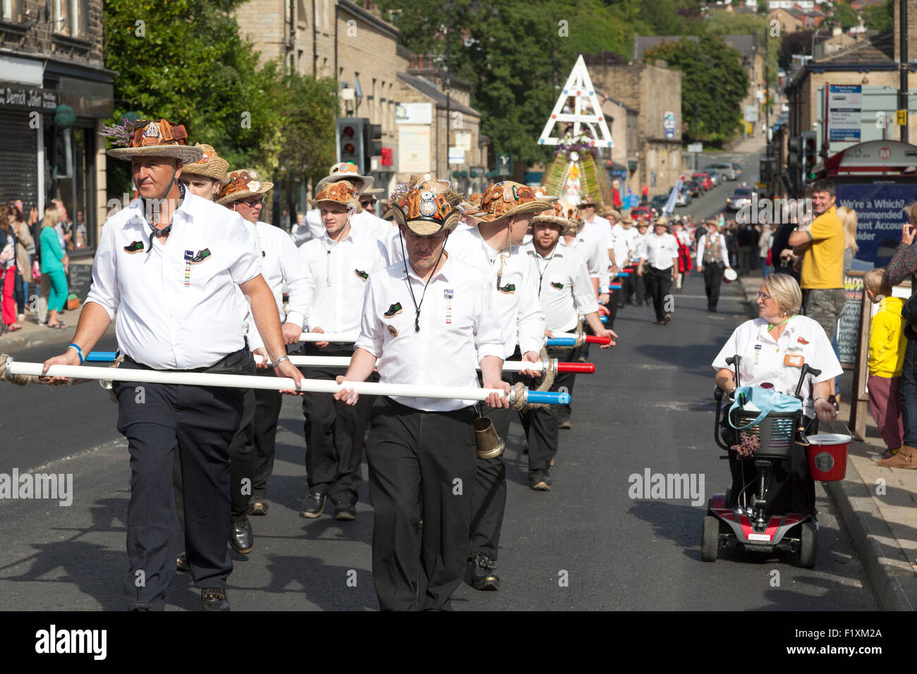 Men pulling the rushcart in the Rushbearing festival procession ...