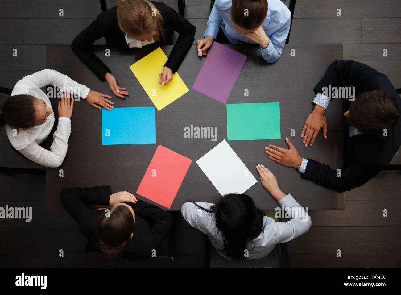 business people with colored paper Stock Photo - Alamy