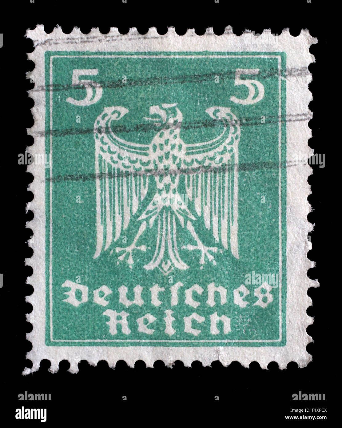 Stamp printed in Germany shows the Eagle, coat of arms of Germany ...