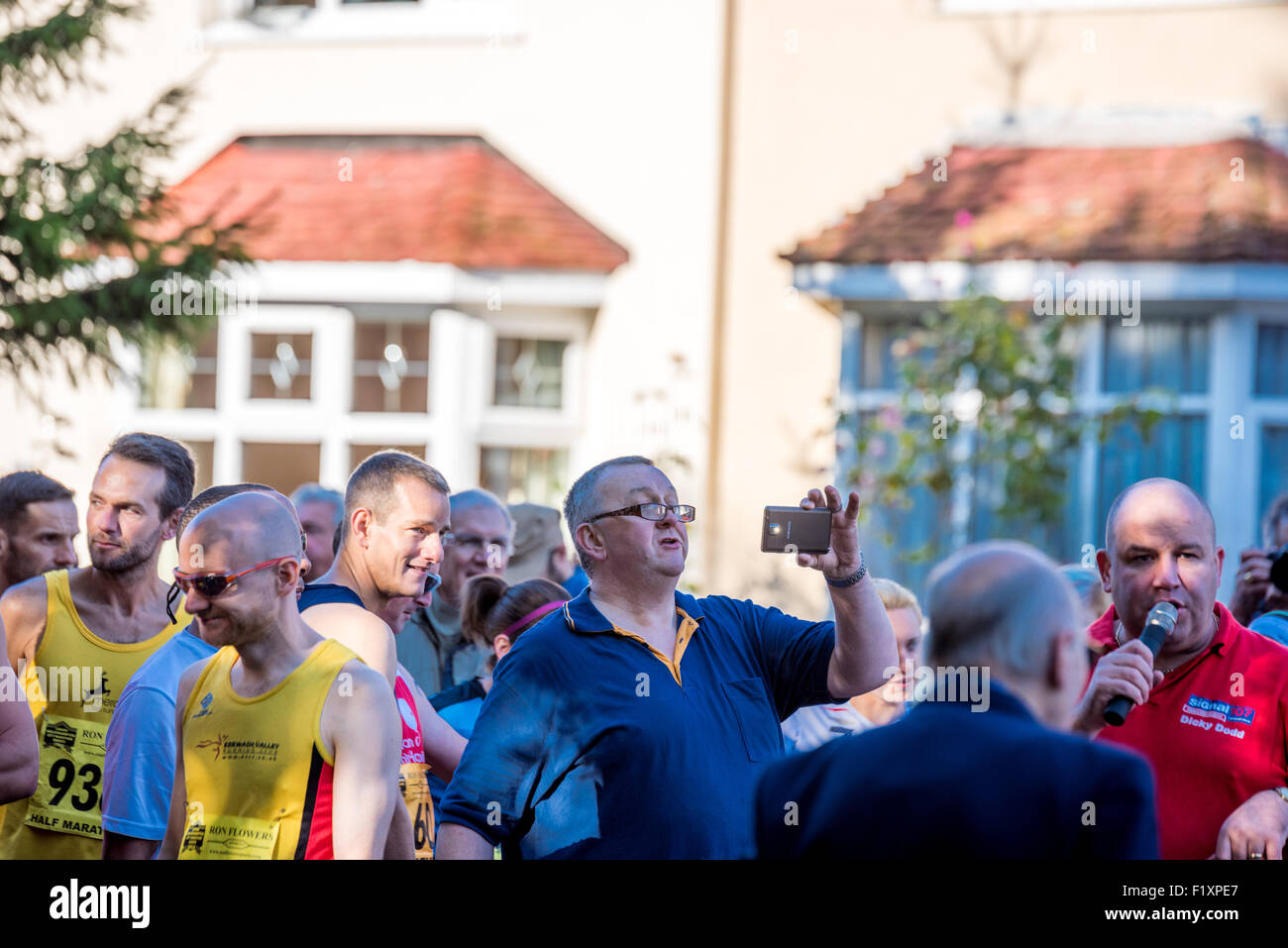 Dicky dodd signal 107 radio DJ talking to the runners at the start of ...
