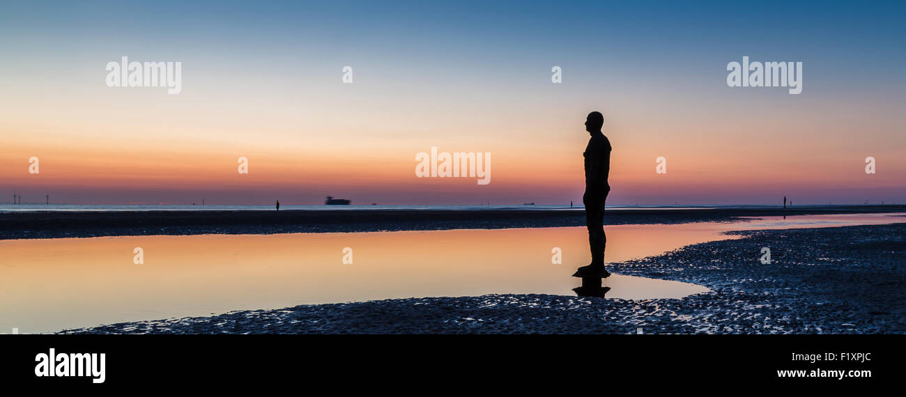 Panoramic image of an Iron Man at sunset Stock Photo - Alamy