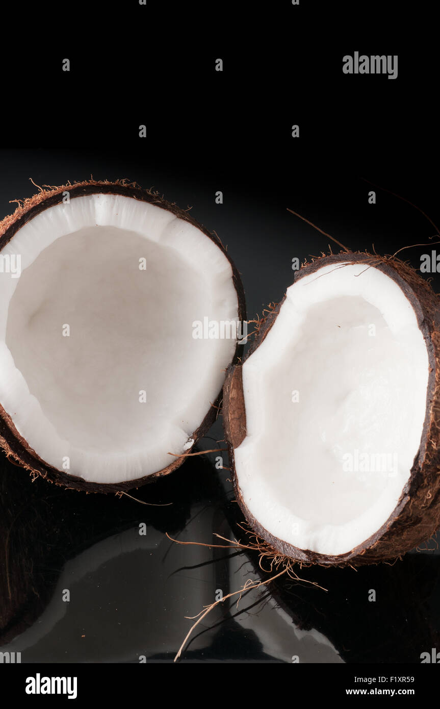 Broken open coconut hi-res stock photography and images - Alamy