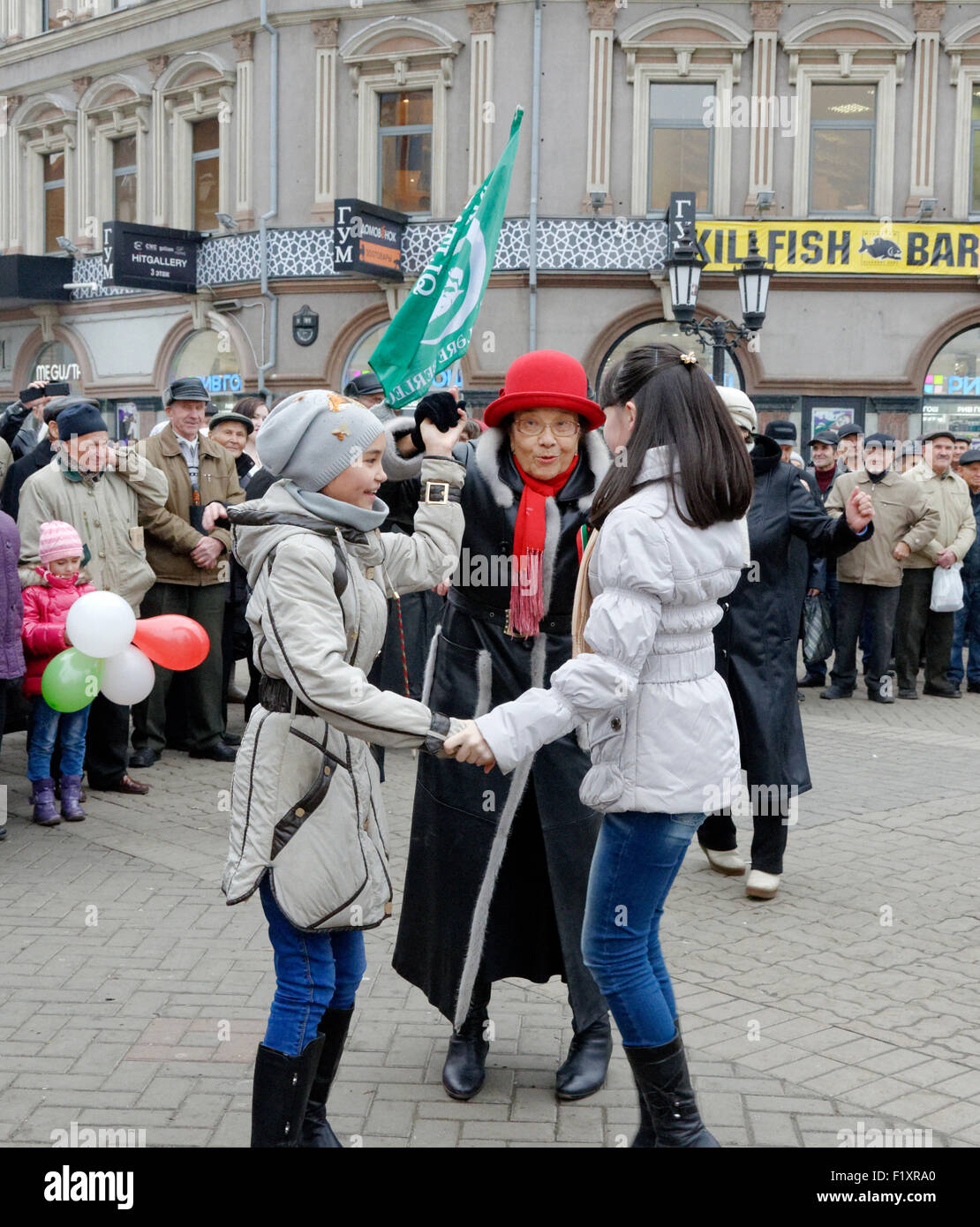 Woman and girls dancing in the street in Kazan to celebrate the ...