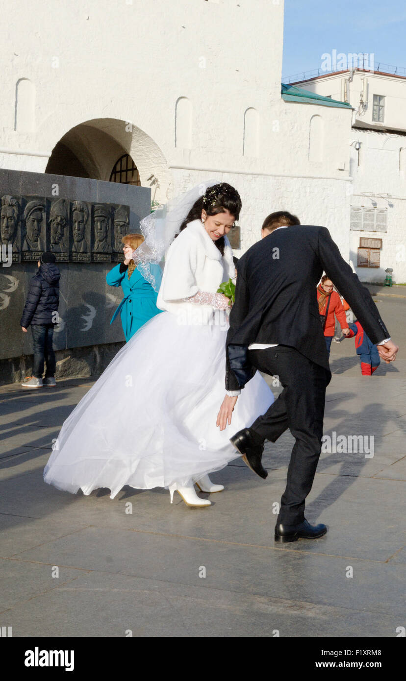 Young Russian couple, bride and groom, on their wedding day at the ...