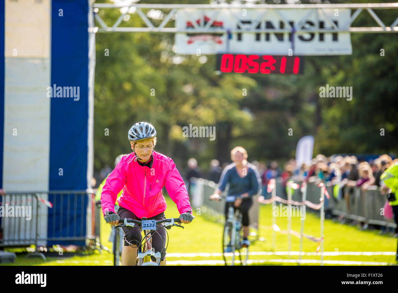 Cyclists finishing the 20k bike ride at The Carvers sponsored ...