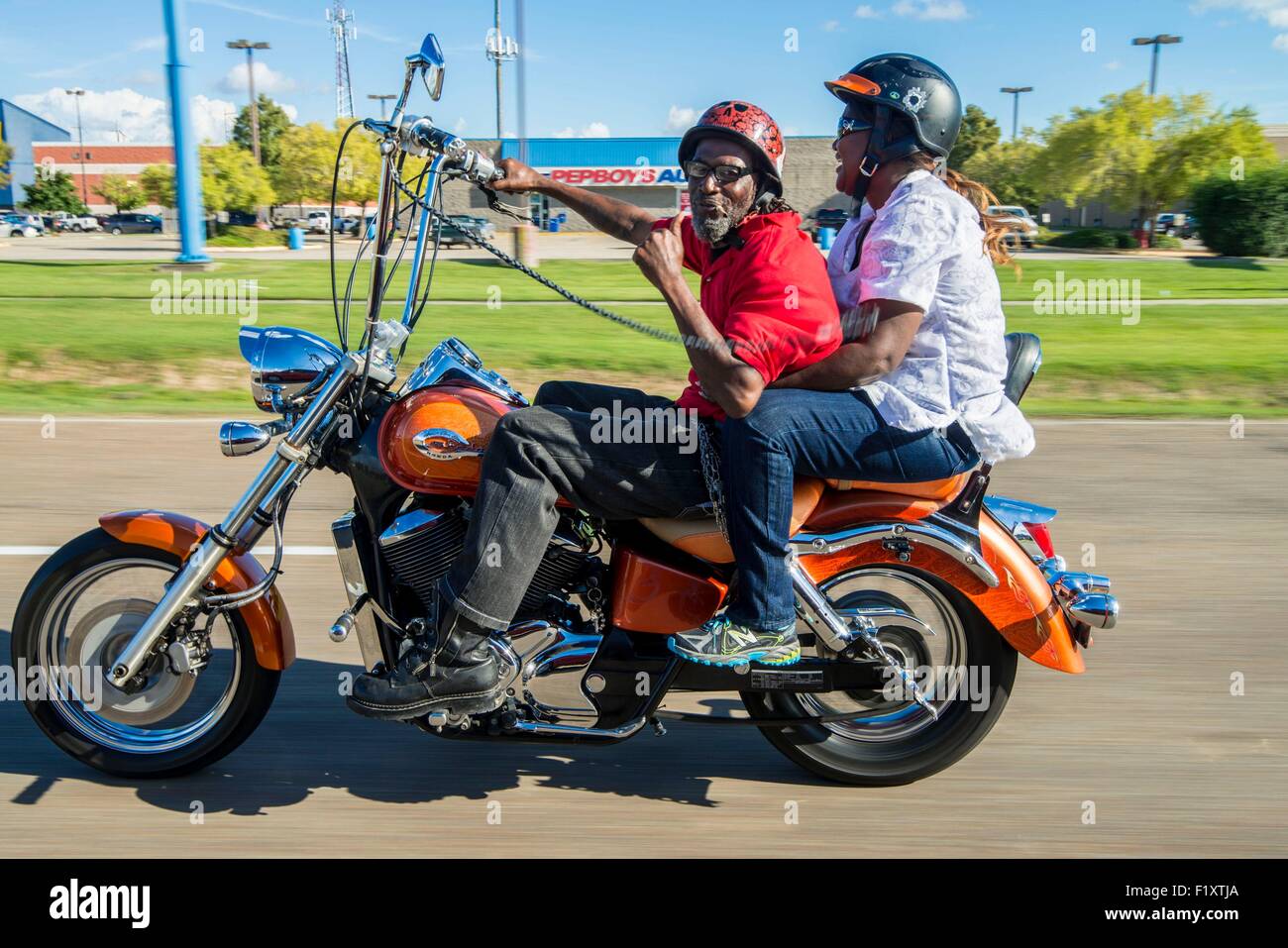 Couple riding motorcycle hi-res stock photography and images - Alamy