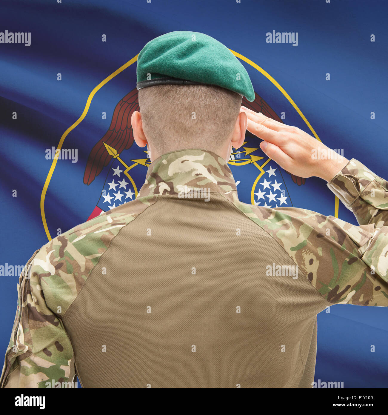 Soldier saluting to US state flag series - Utah Stock Photo - Alamy