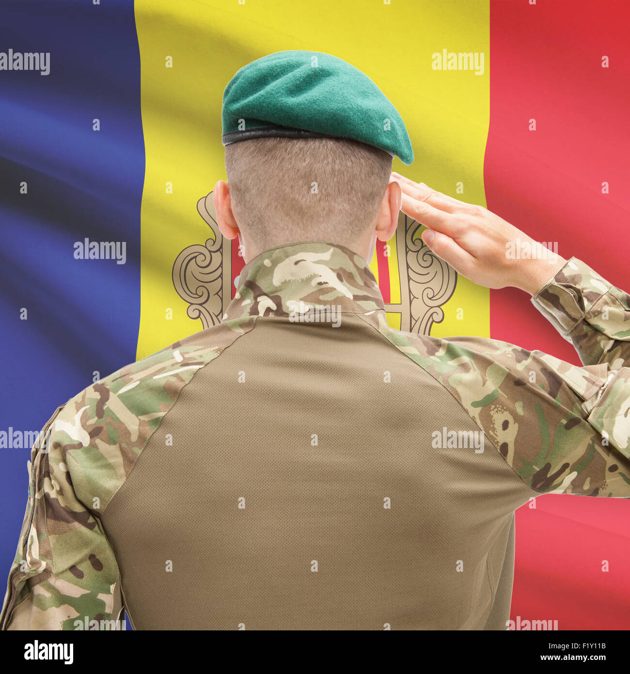 Soldier in hat facing national flag series - Andorra Stock Photo - Alamy