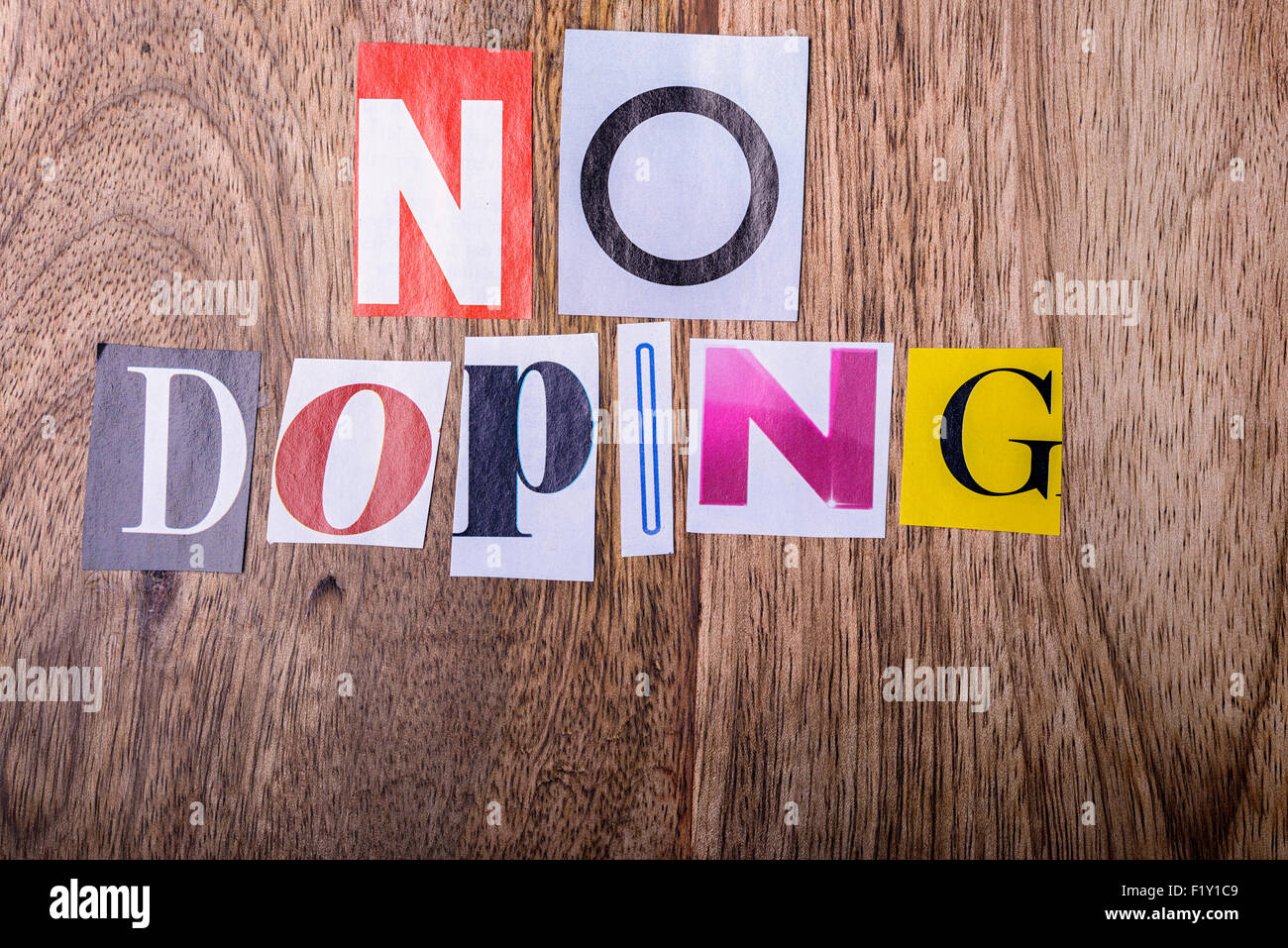 no doping text made with newspaper letters on wood Stock Photo - Alamy