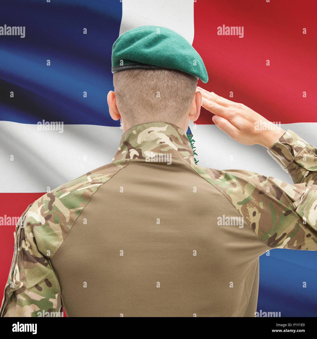 Soldier in hat facing national flag series - Dominican Republic Stock ...