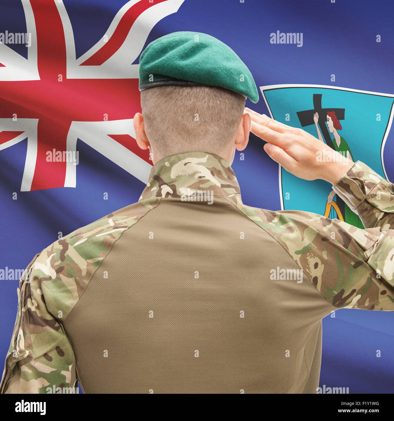 Soldier in hat facing national flag series - Montserrat Stock Photo - Alamy