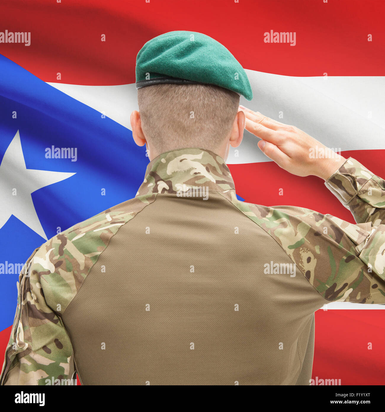 Soldier in hat facing national flag series - Puerto Rico Stock Photo ...