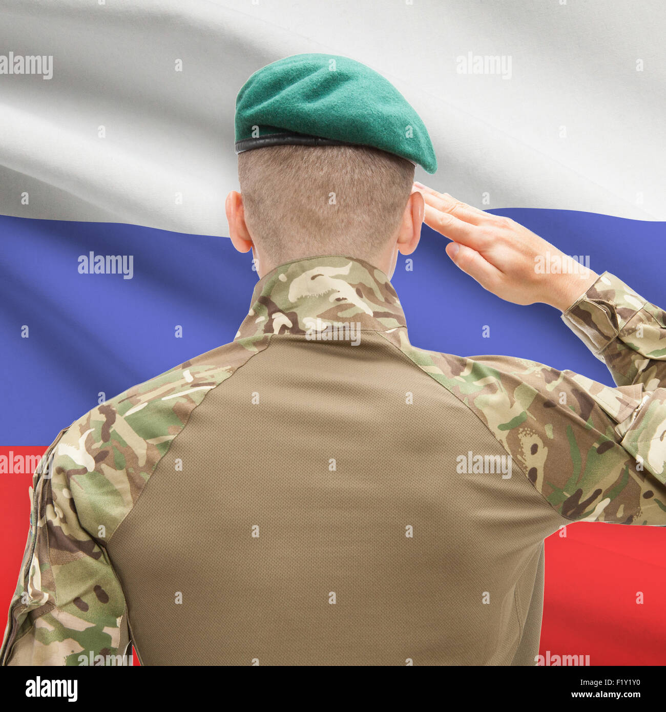 Soldier in hat facing national flag series - Russia Stock Photo - Alamy