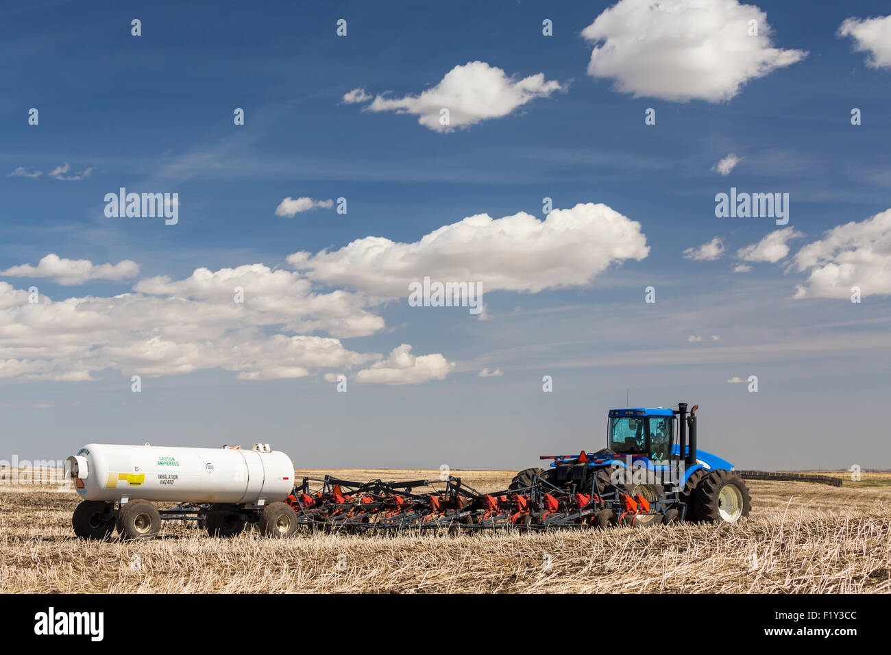 Tractor with seeder hi-res stock photography and images - Alamy