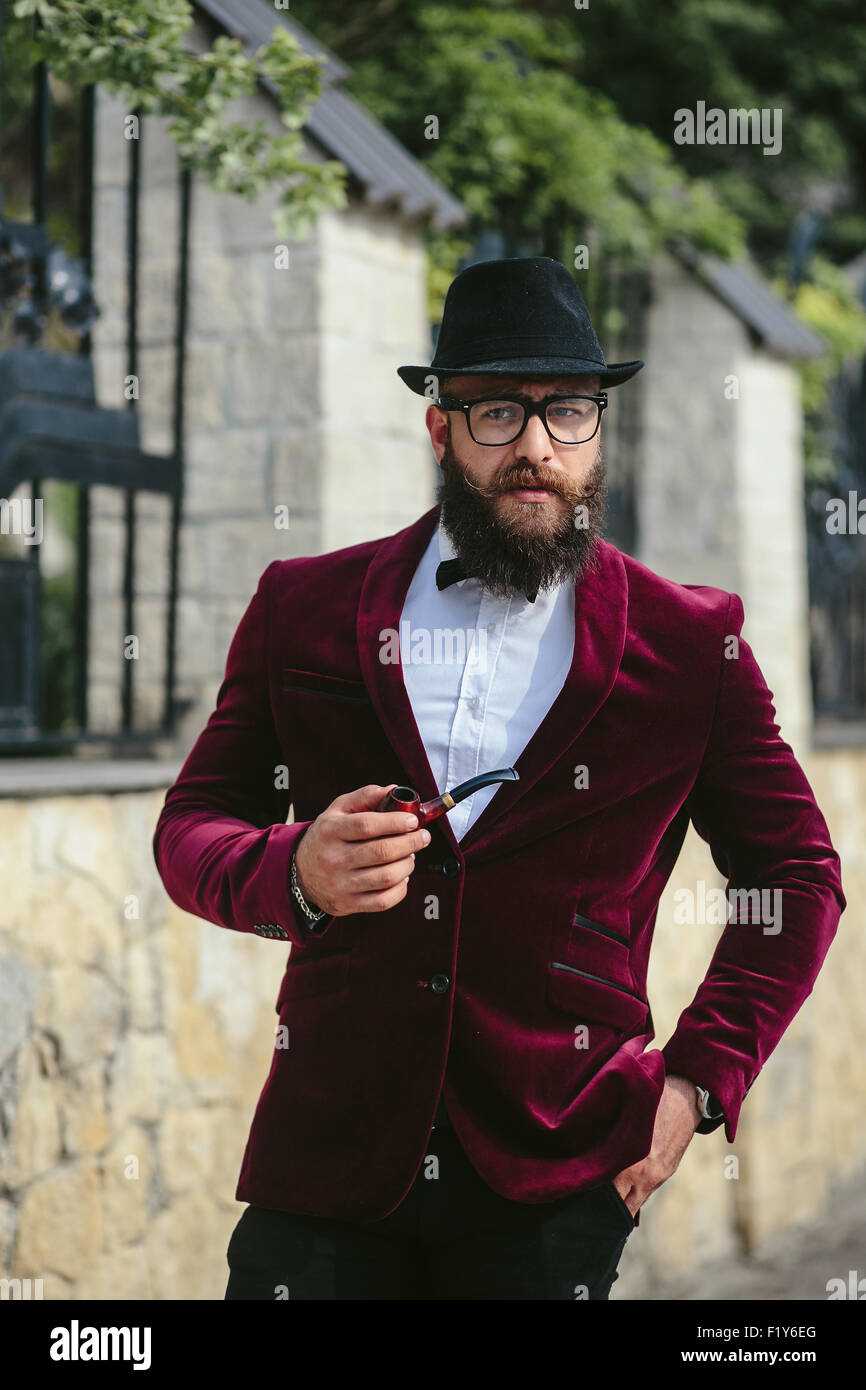 rich man with a beard, thinking about business Stock Photo - Alamy