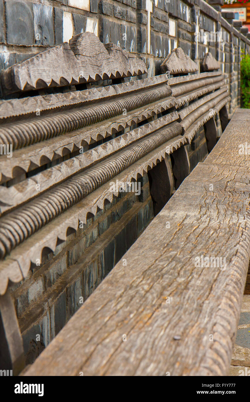 Old destroyed wooden bench nicely decorated Stock Photo - Alamy