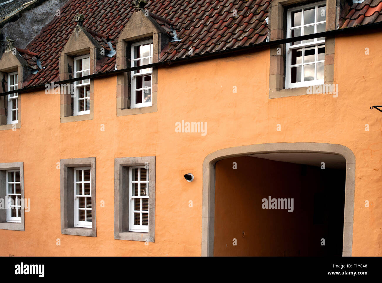 Orange painted cottage, Musselburgh Stock Photo - Alamy